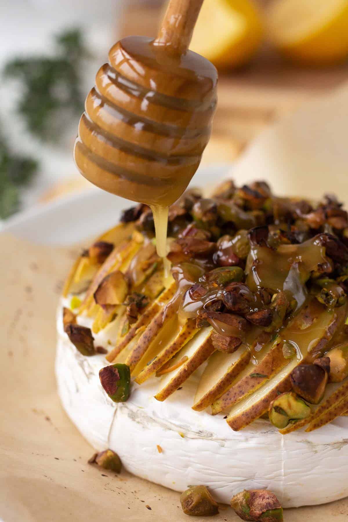 Baked Brie with Pears, Pistachios, and Honey - Cup of Zest